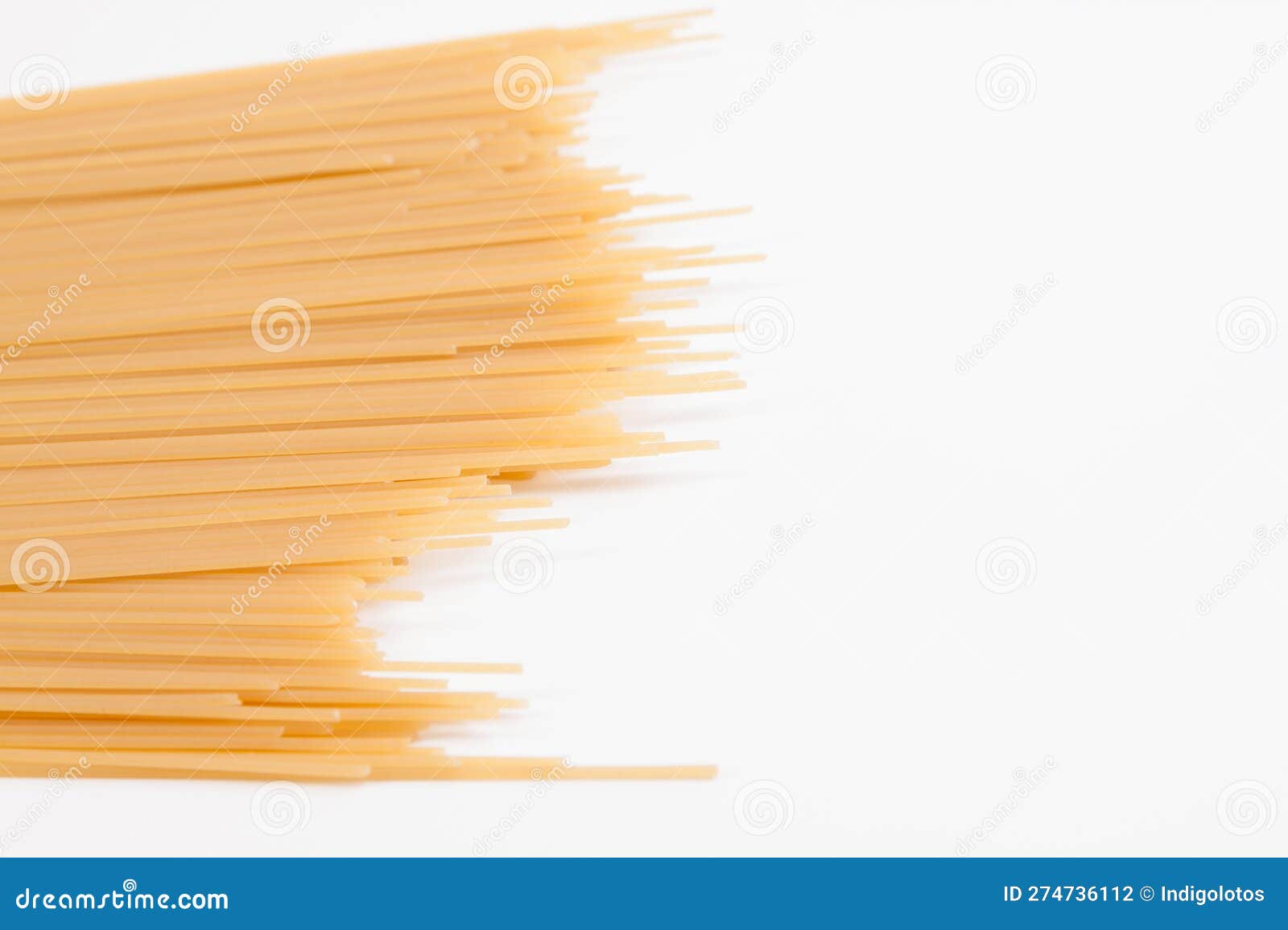 Spaghetti Spread Out on a White Surface Stock Photo - Image of ...