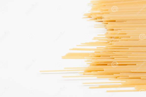 Spaghetti Spread Out on a White Surface Stock Photo - Image of orange ...