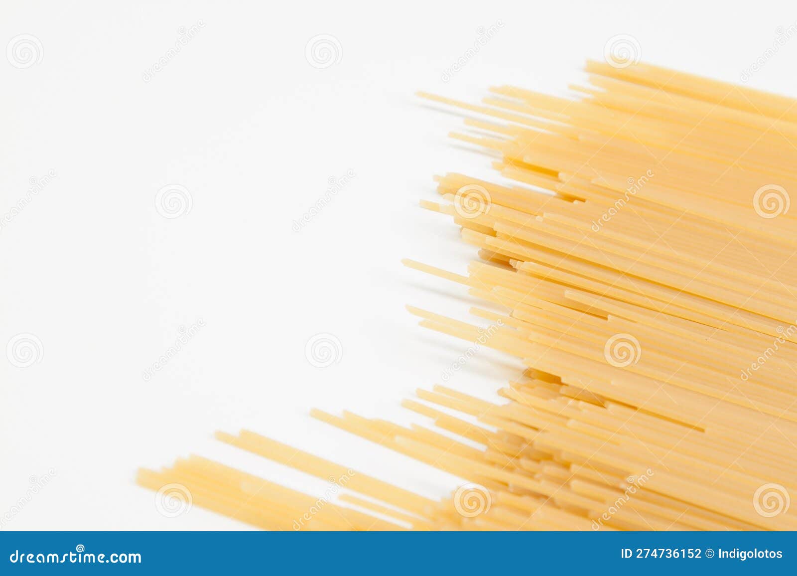 Spaghetti Spread Out on a White Surface Stock Photo - Image of group ...