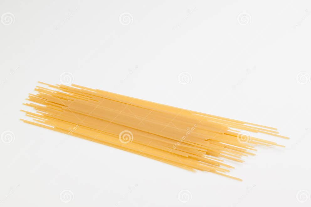 Spaghetti Spread Out on a White Surface Stock Image - Image of orange ...