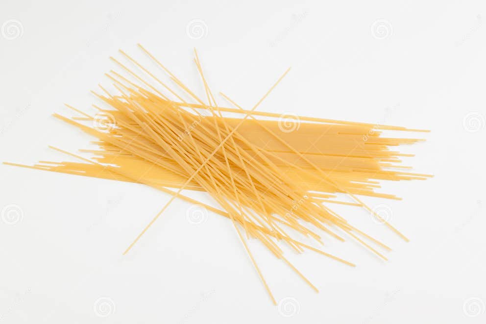 Spaghetti Spread Out on a White Surface Stock Image - Image of cooking ...
