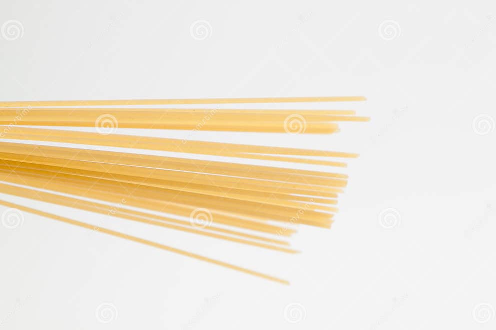 Spaghetti Spread Out on a White Surface Stock Image - Image of culinary ...