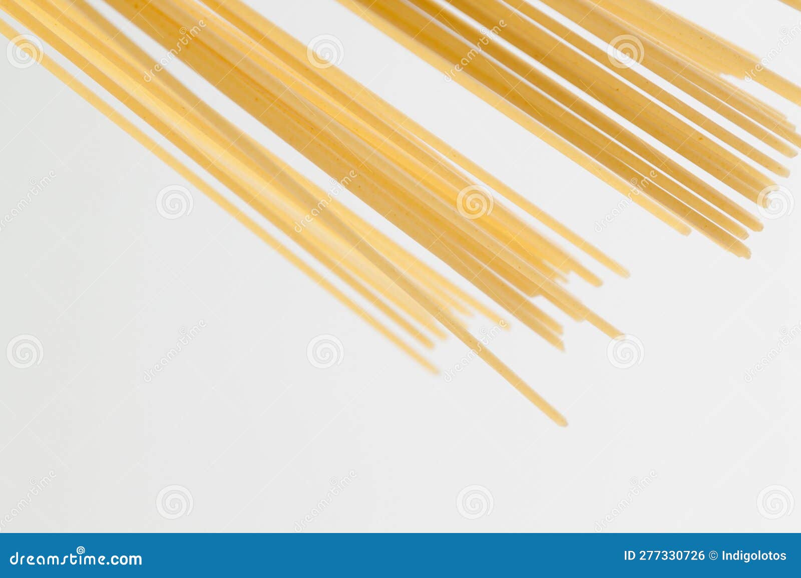 Spaghetti Spread Out on a White Surface Stock Photo - Image of ...