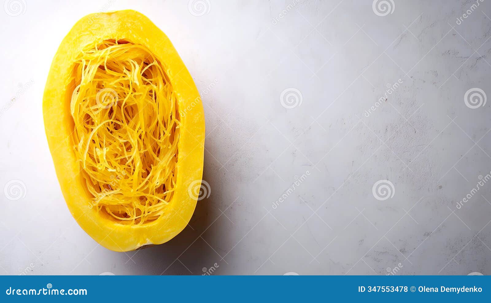 Spaghetti Squash Halved Reveals Its Stringy Interior on a Smooth White ...