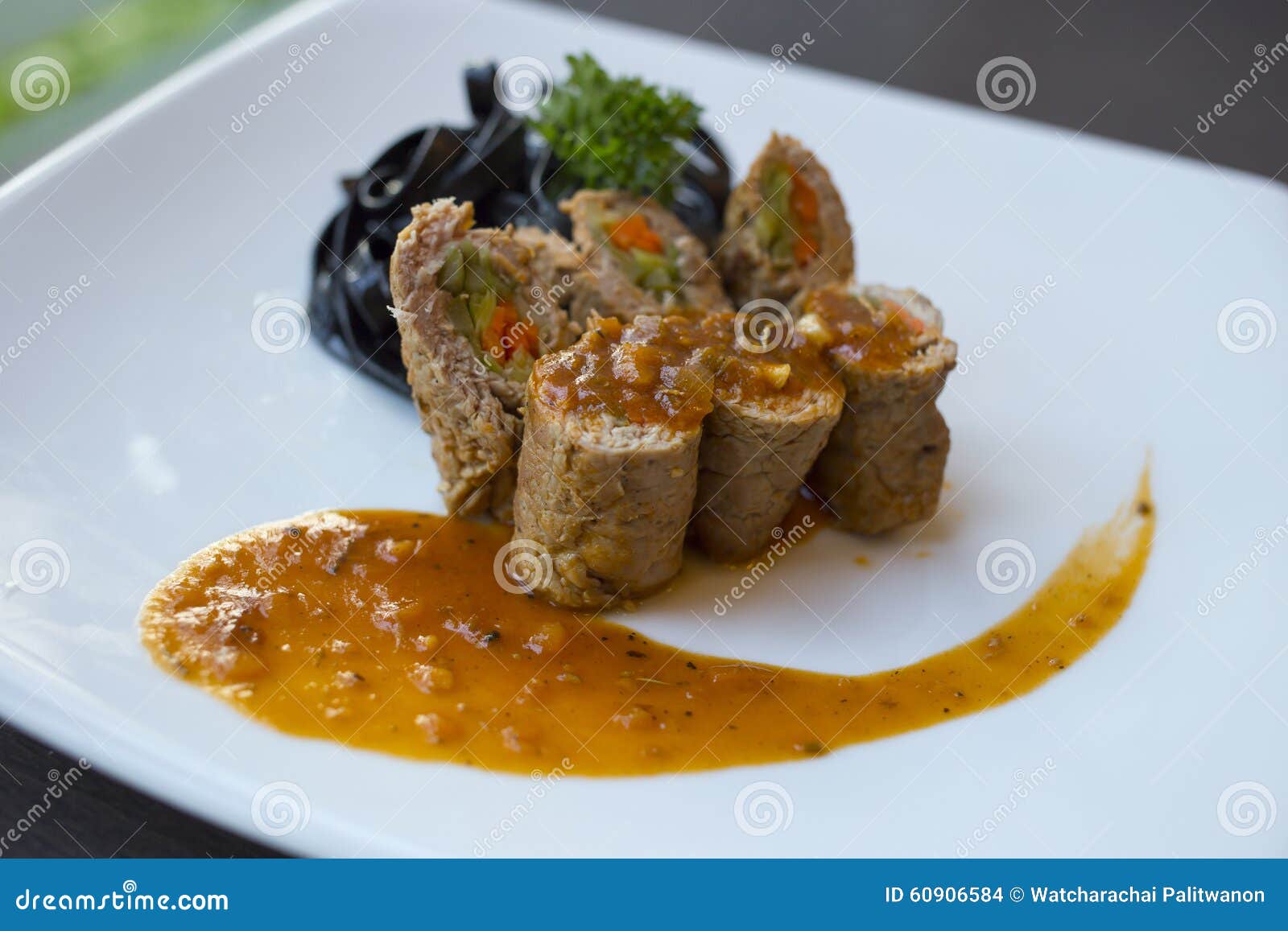 Spaghetti Strands Black Beef with Orange Sauce Stock Photo - Image of ...