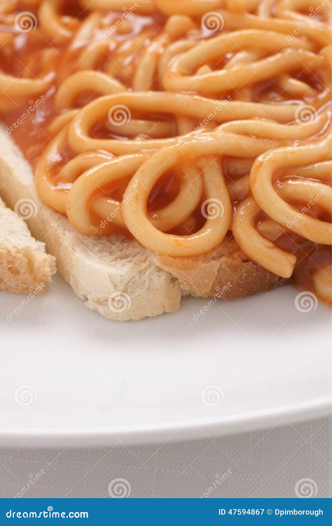 Spaghetti on toast stock image. Image of noodle, sauce - 47594867