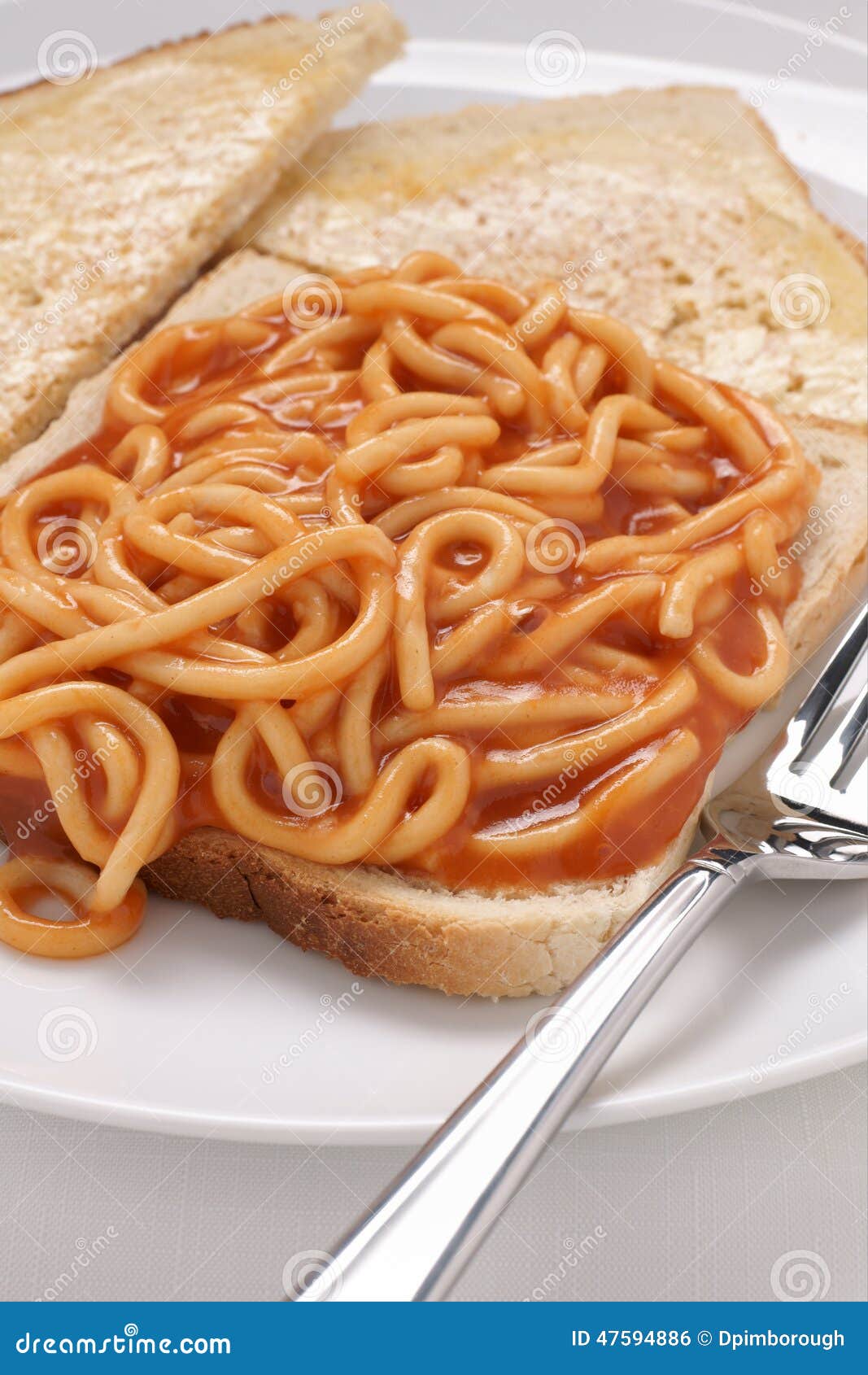 Spaghetti on toast stock photo. Image of simple, fork - 47594886