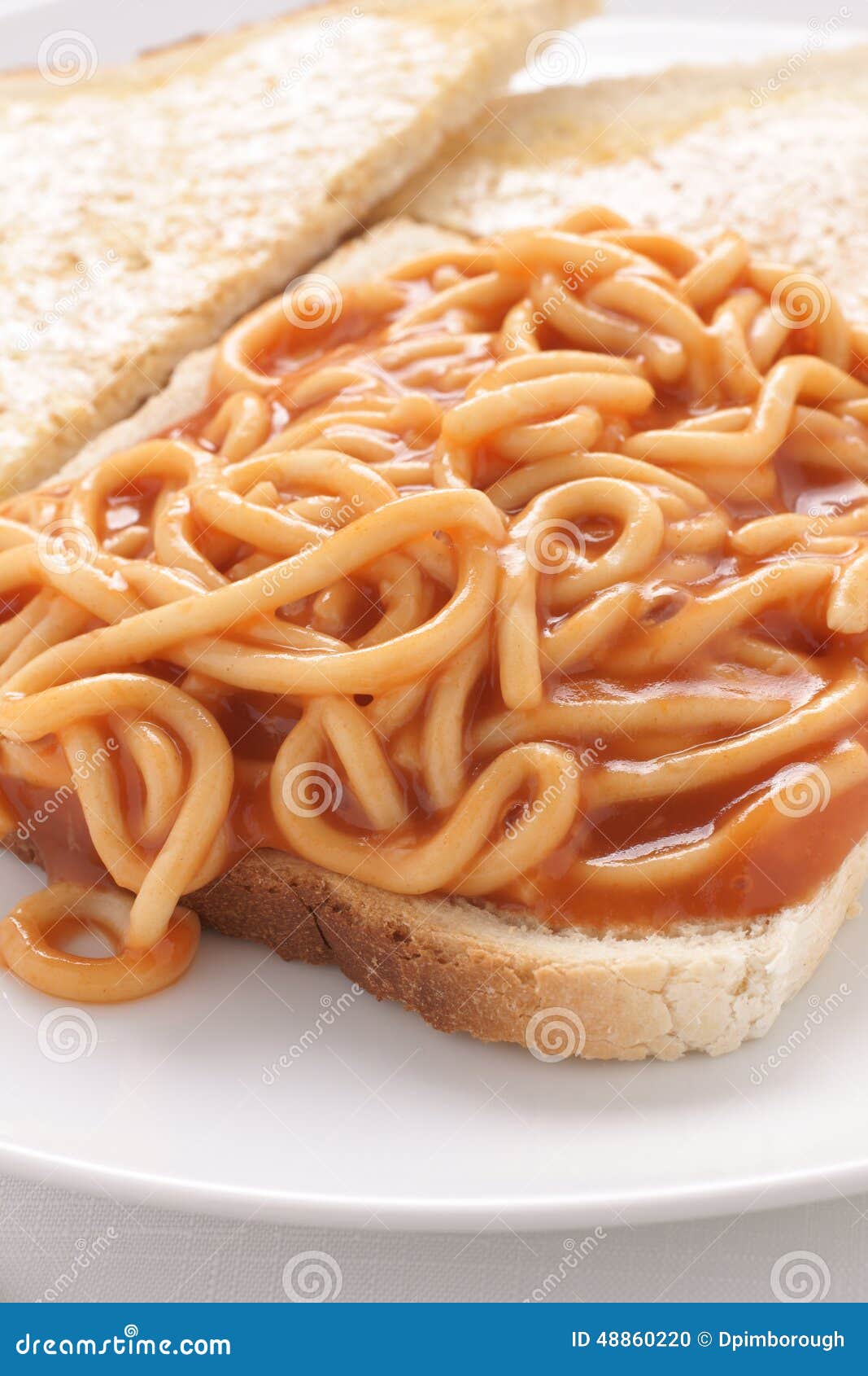 Spaghetti on toast stock photo. Image of tinned, ketchup - 48860220