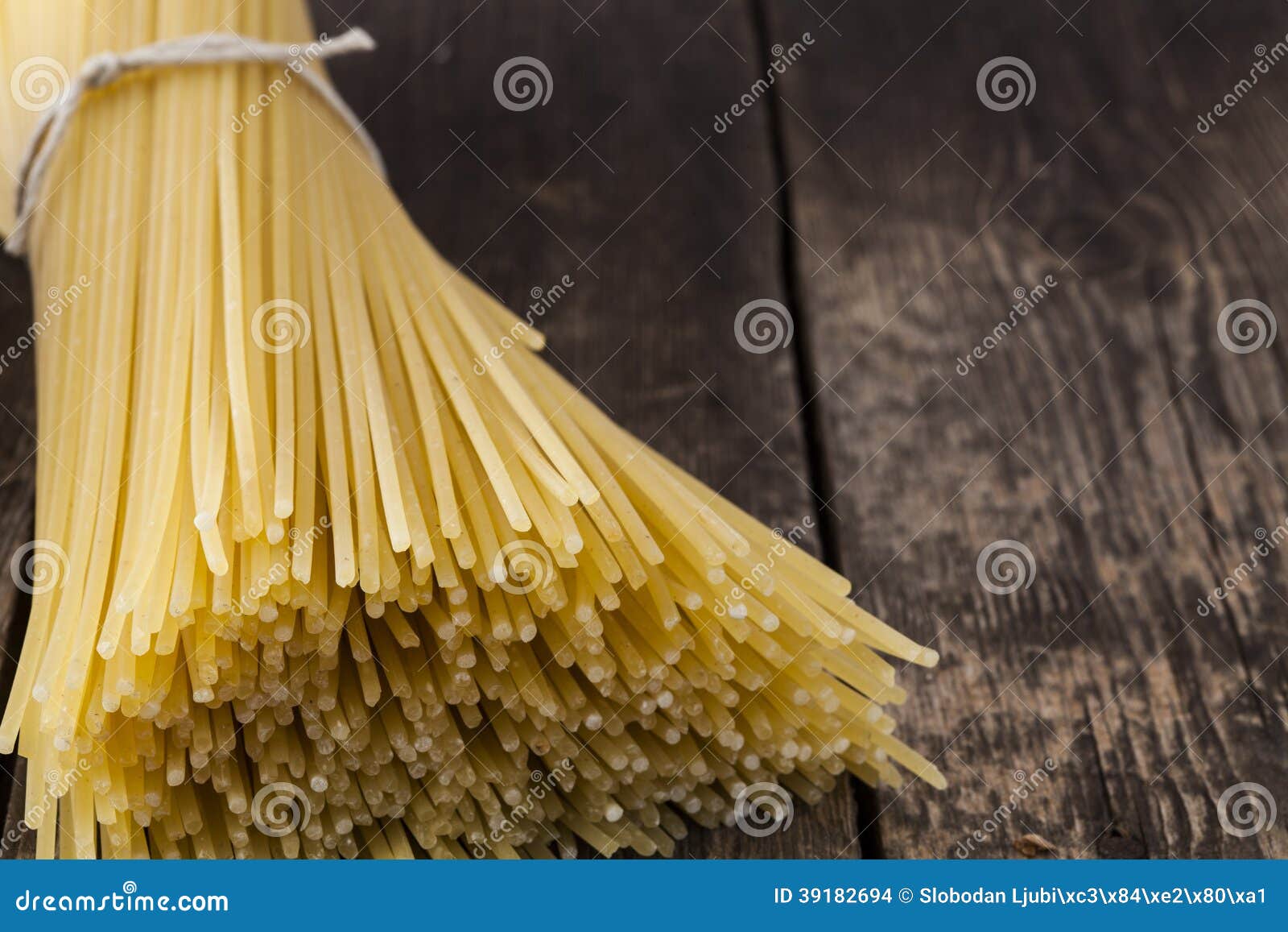 Spaghetti on a Wooden Table Stock Photo - Image of lunch, plate: 39182694