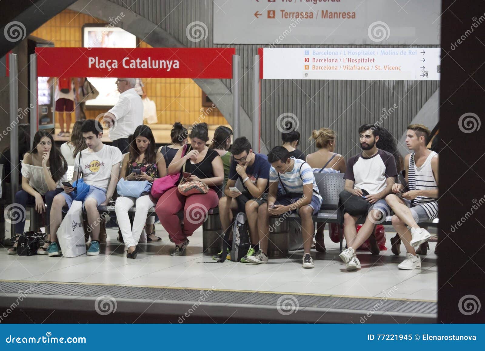 SPAIN Metro in Barcelona, the People Sitting on the Bench on the ...