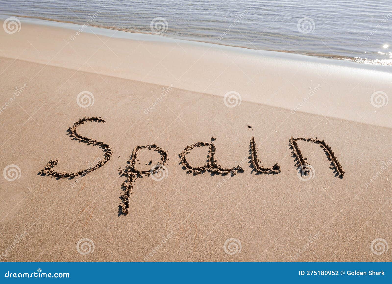 Spain Title on the Sand Beach Near the Ocean Stock Photo - Image of ...