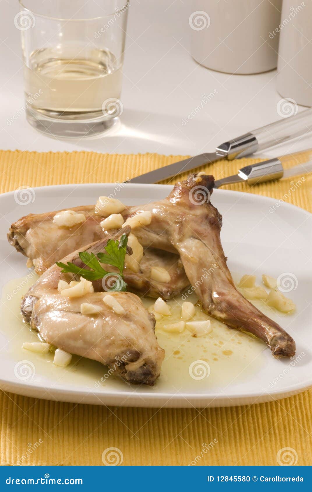 Spanish Cuisine. Rabbit in Garlic Sauce. Stock Photo - Image of dish ...