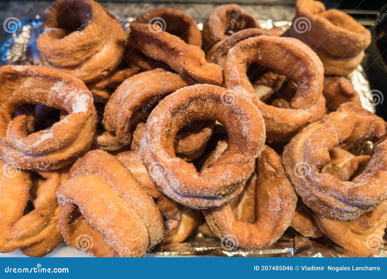 Spanish Donuts Wrapped in Sugar Stock Photo - Image of caloric ...