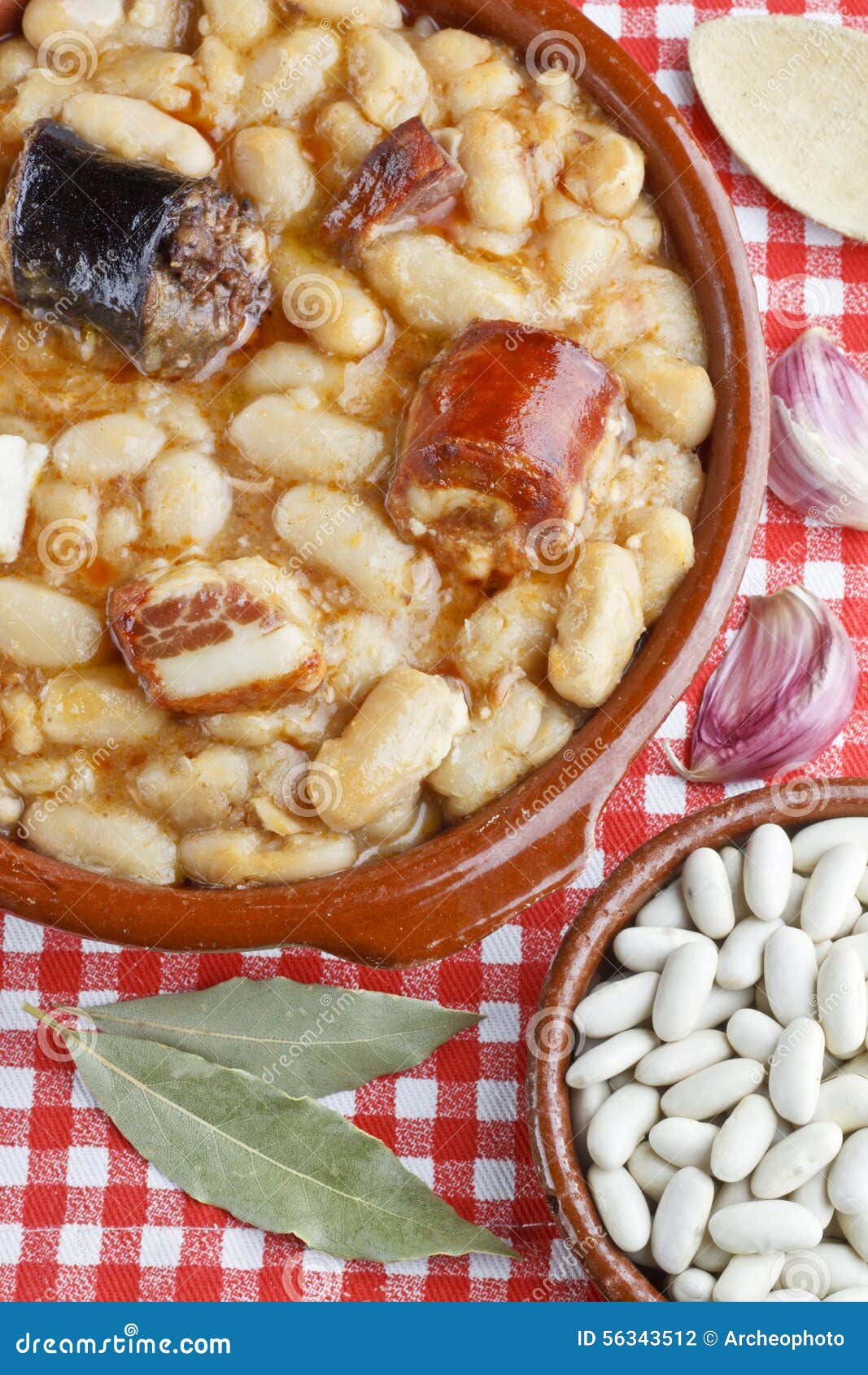 Spanish Fabada in an Earthenware Dish with Ingredients Stock Photo ...