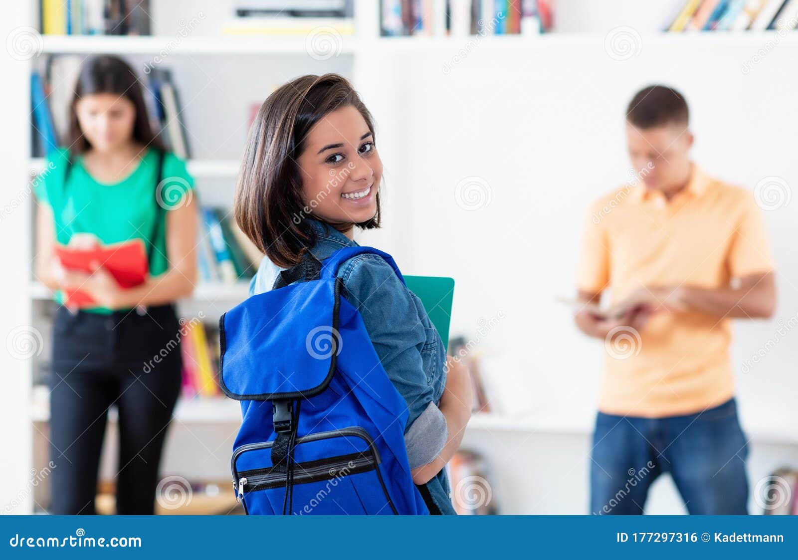 Spanish Female Student Learning with Group of Students Stock Photo ...