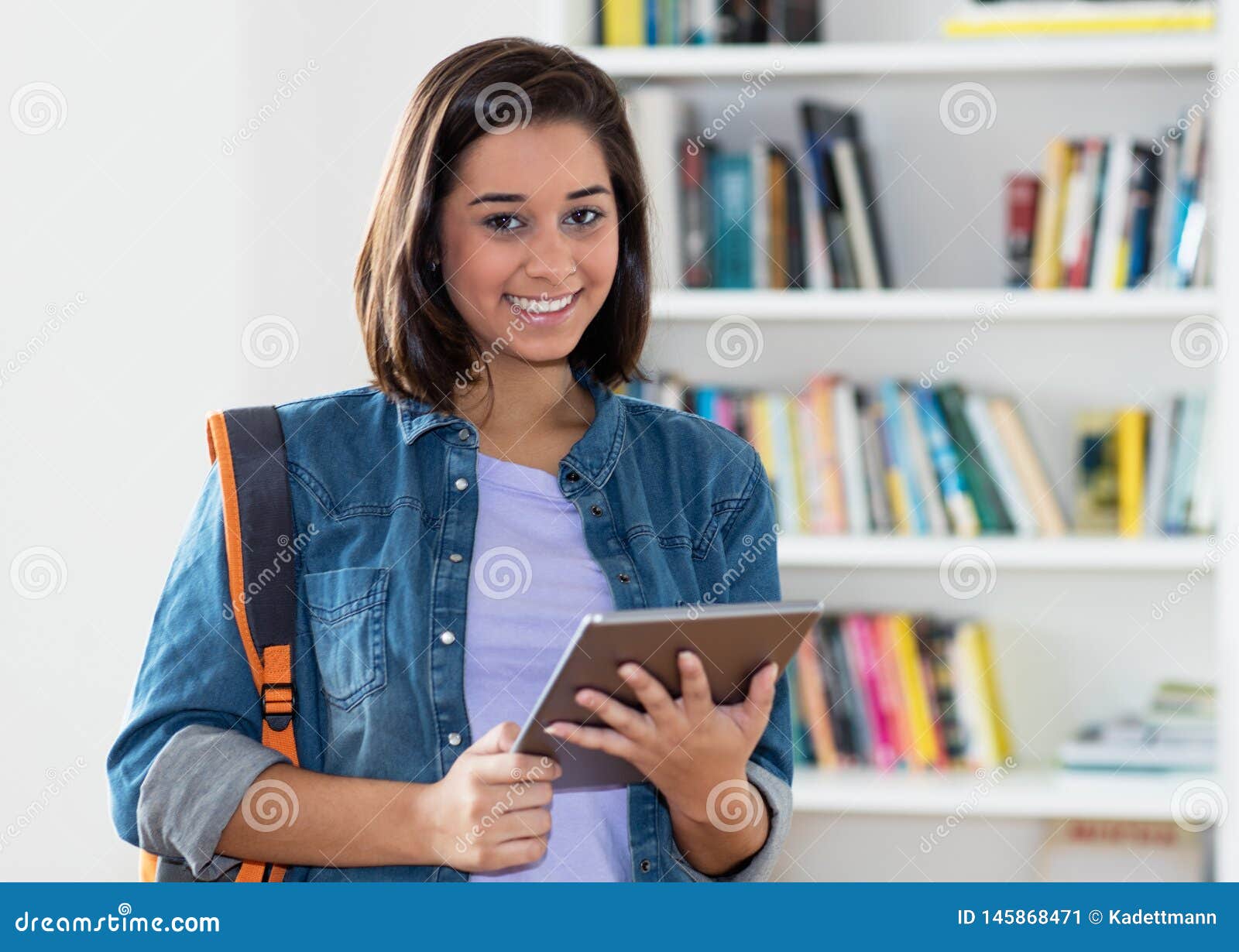 Spanish Female Student with Online with Tablet Computer Stock Image ...