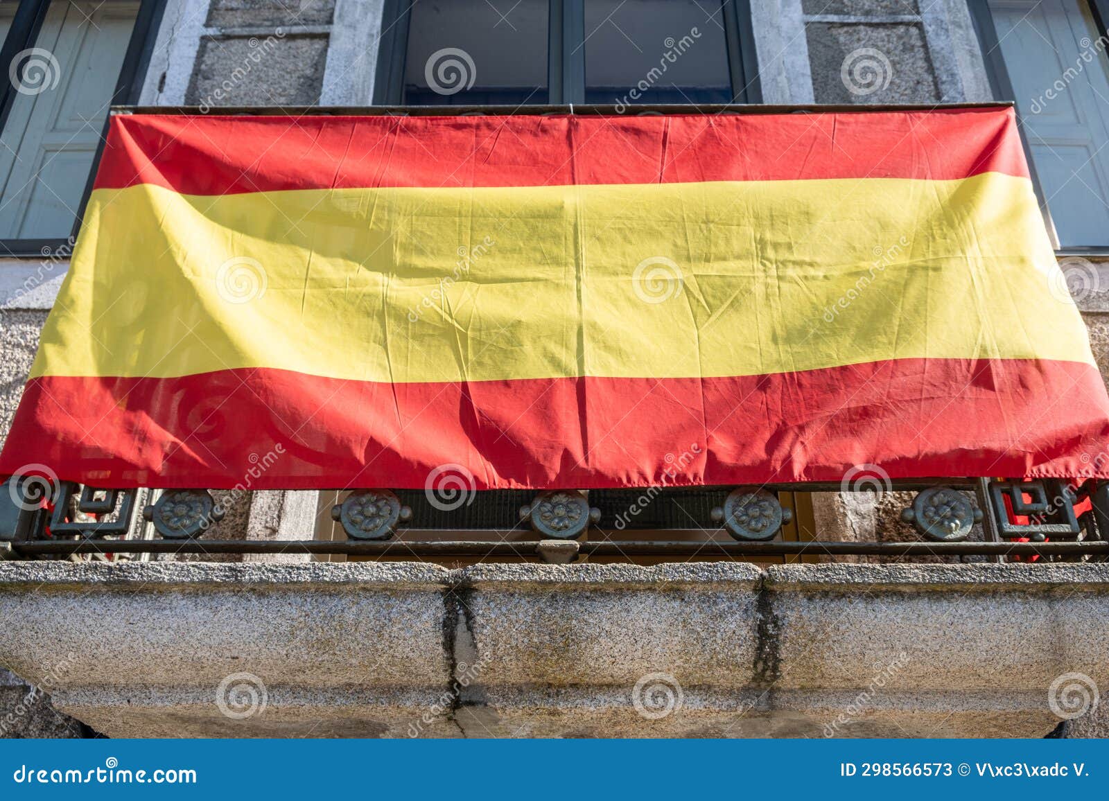 Spanish Flag Hanging on the Balcony of a House in Spain Stock Image ...