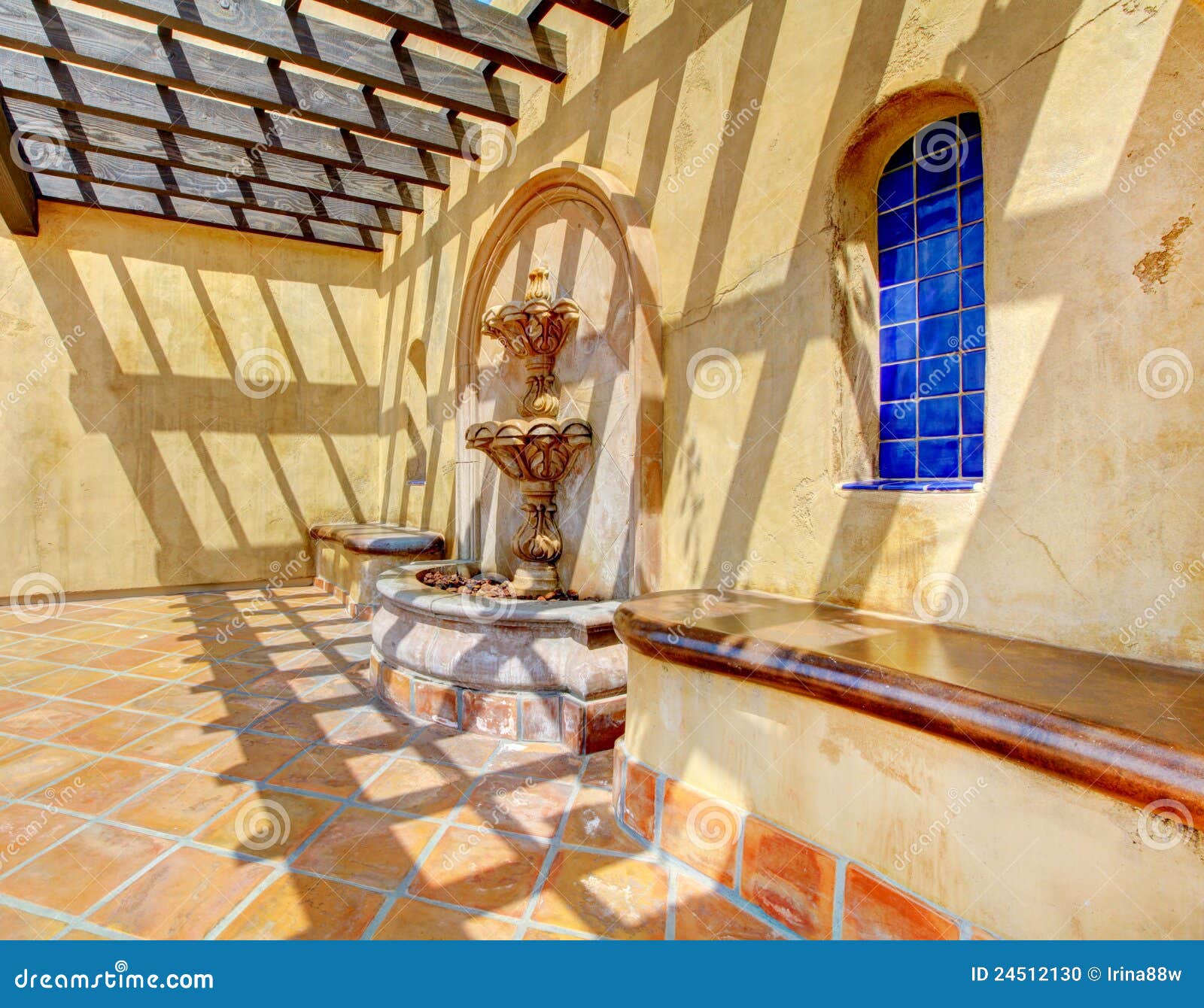 Spanish Fountain Detals with Yellow Wall. Stock Photo - Image of bench ...