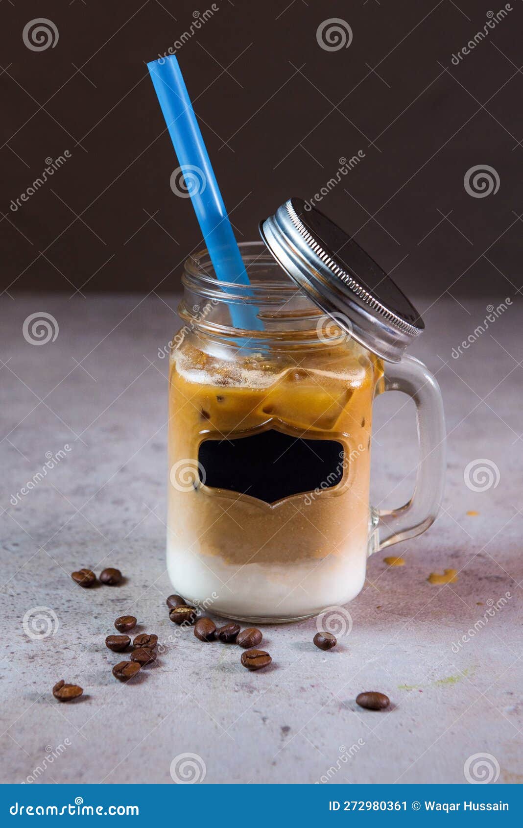 Spanish Latte Serving in Jar with Straw Side View on Background Stock ...