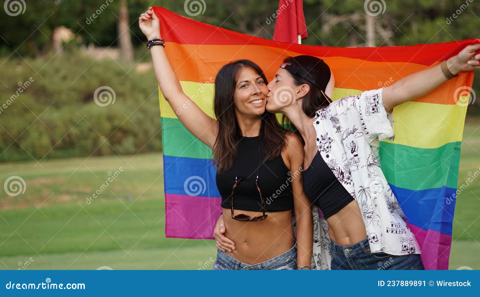 Spanish Lesbian Couple Posing In A Golf Field With A Pride Flag Stock Image Image Of Adult 2169
