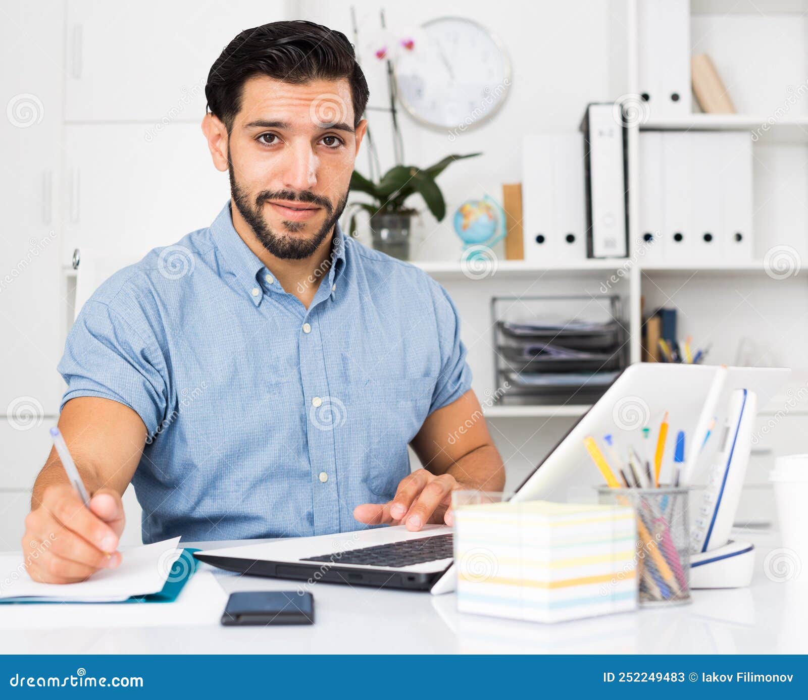 Spanish Man is Working with Documents in Laptop Stock Image - Image of ...