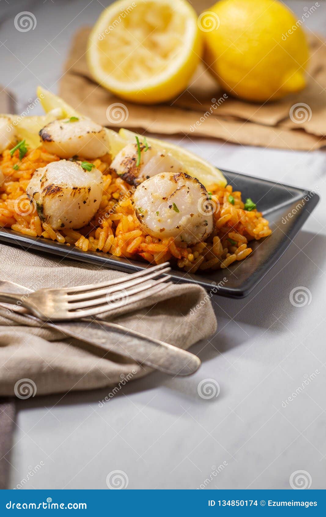 Spanish Rice Lemon Scallops Stock Photo - Image of paella, lunch: 134850174