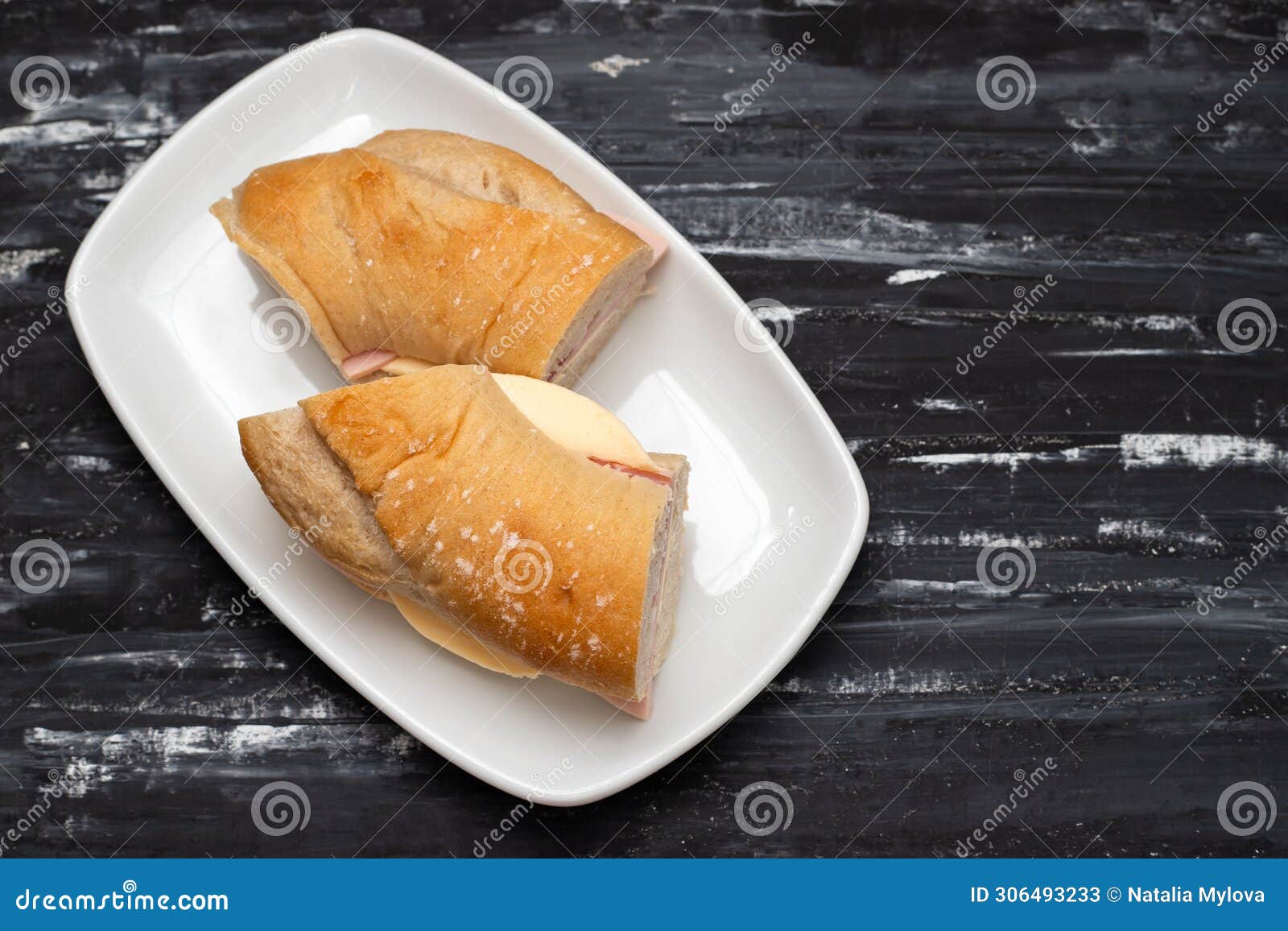 A Spanish Rosca De Jamon Serrano, Ham Sandwich, on a White Plate Stock ...