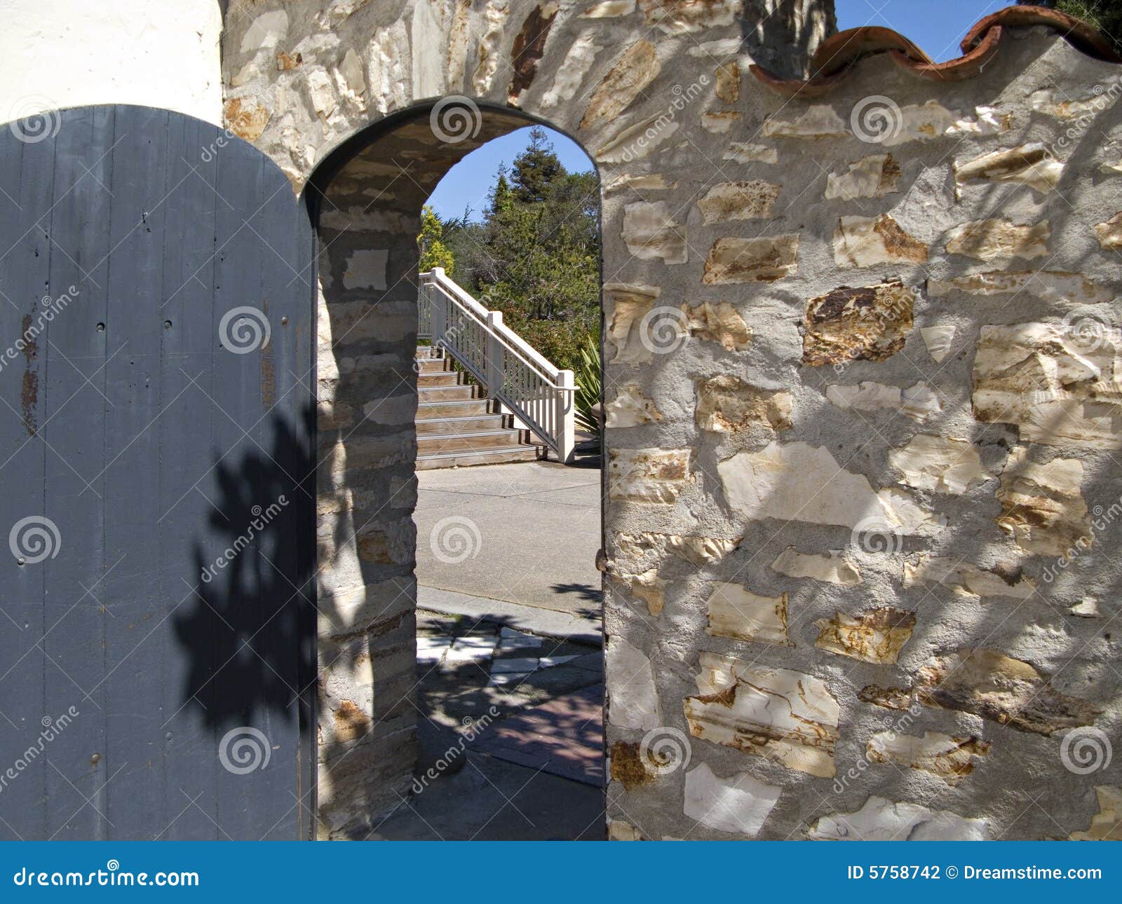 Spanish Style Wall and Gate Stock Photo - Image of pavement, history ...