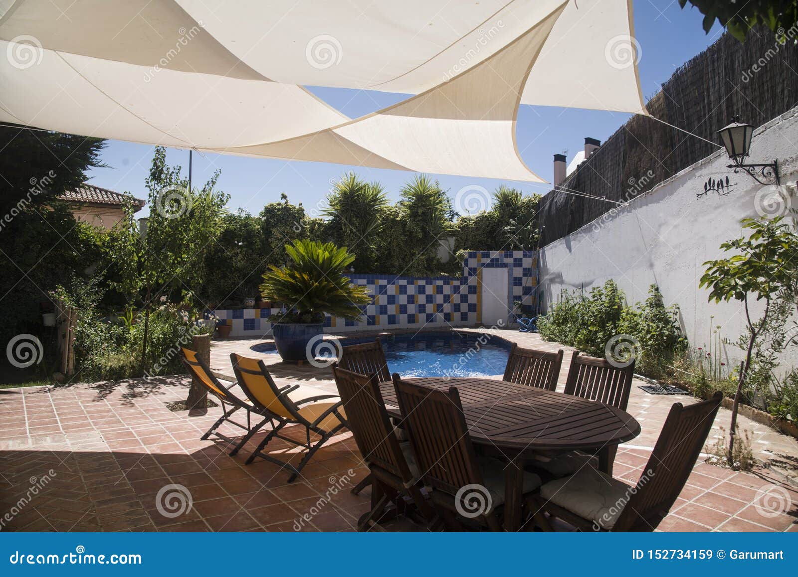 Spanish Summer Courtyard with Greenery and Swimming Pool Stock Image ...