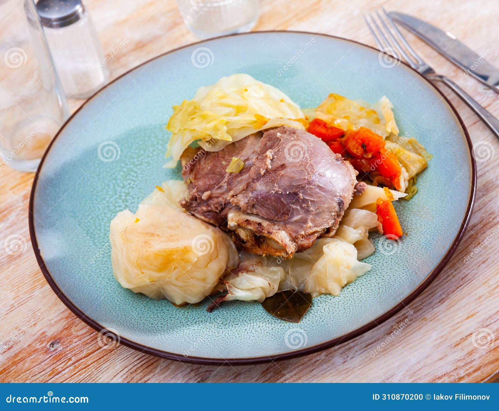 Spanish Traditional Dish - Pork Cheeks with Cabbage Stock Photo - Image ...