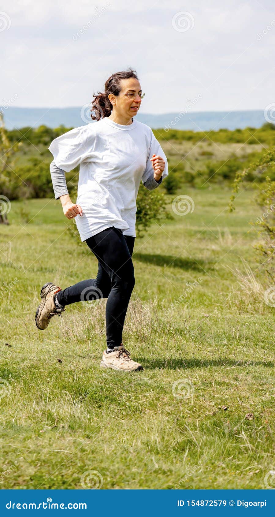 Spanish Woman Running on Meadow Stock Image - Image of fitness, jogging ...