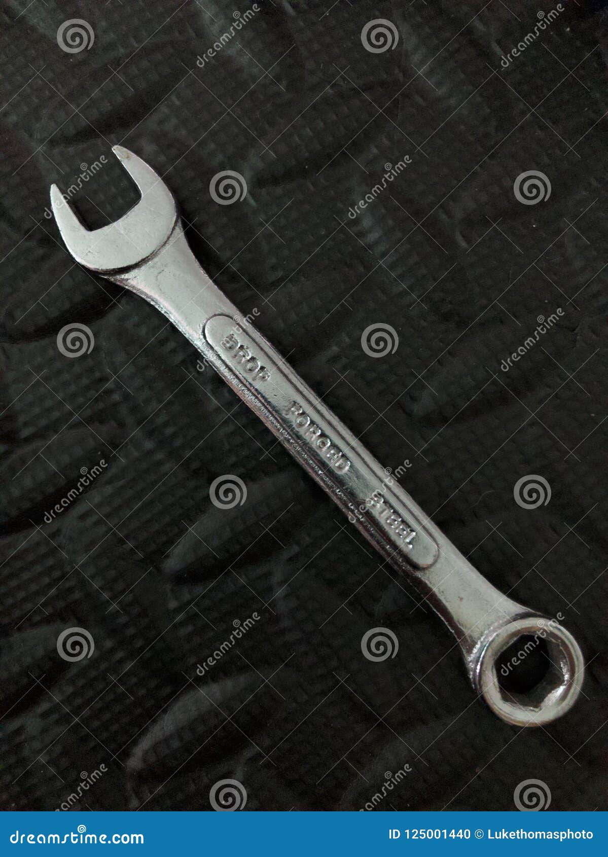 Spanner on workshop floor stock photo. Image of workshop - 125001440