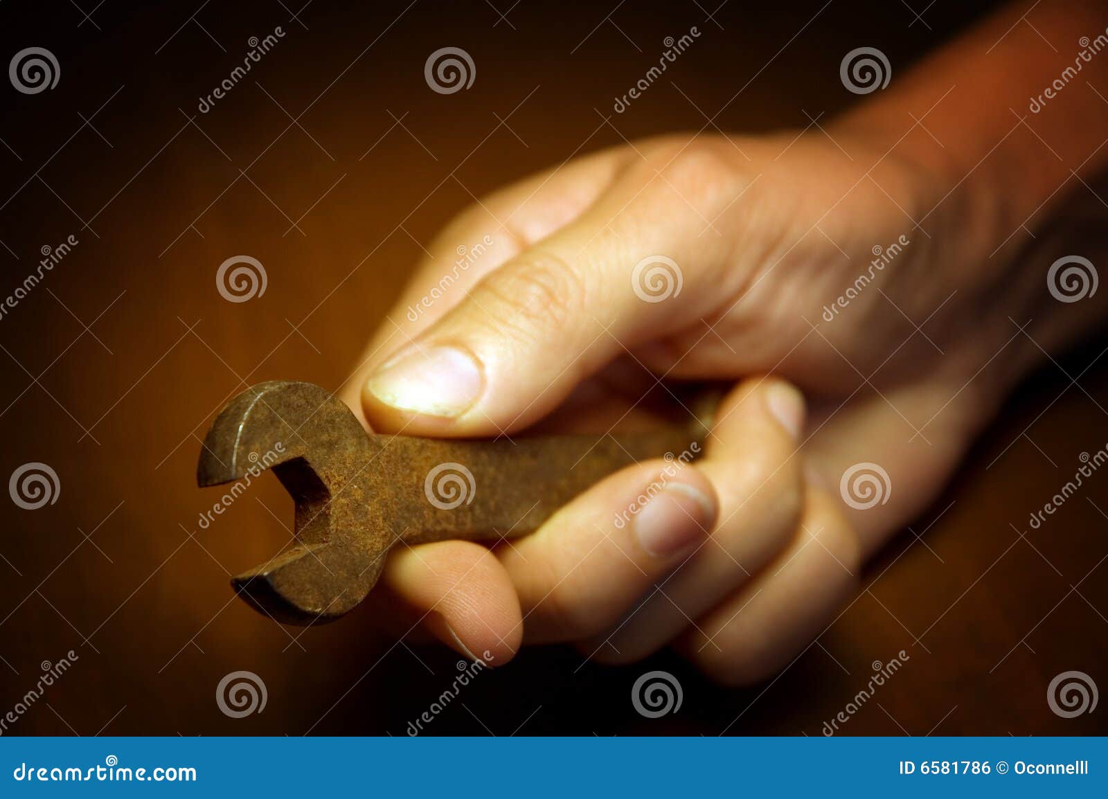 Spanner in Hand stock photo. Image of plumber, handicraft - 6581786