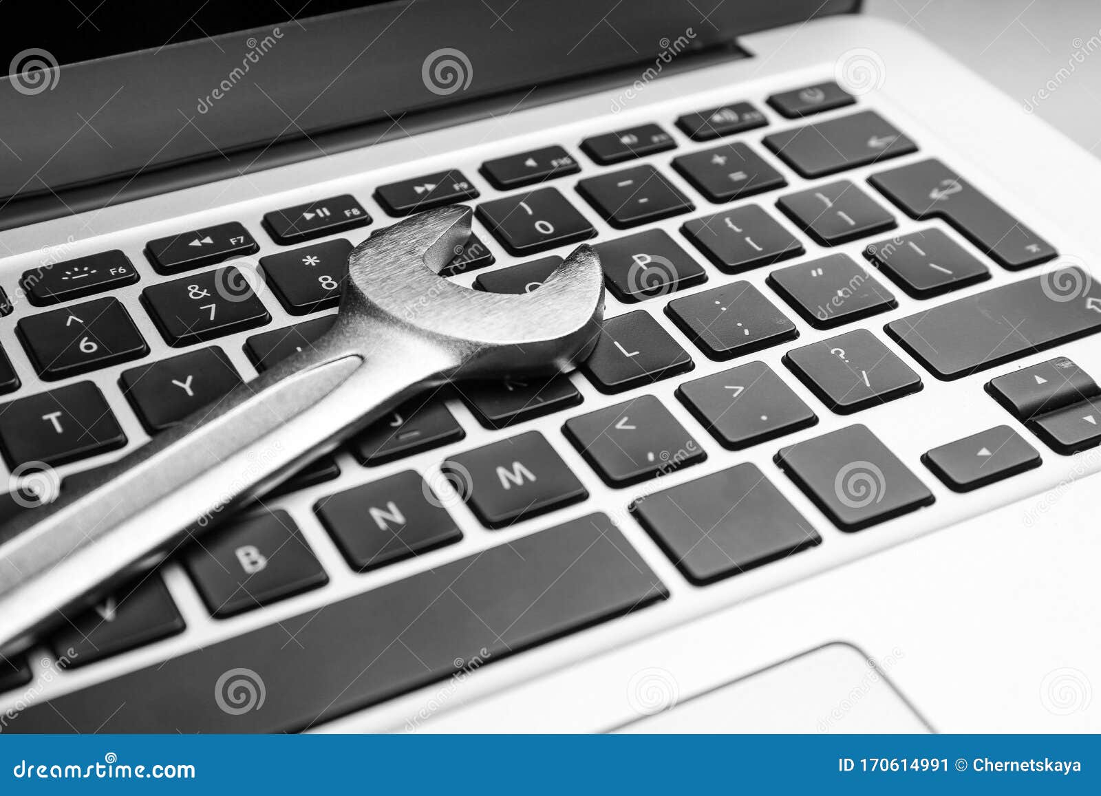 Spanner on Laptop. Concept of Technical Support Stock Image - Image of ...