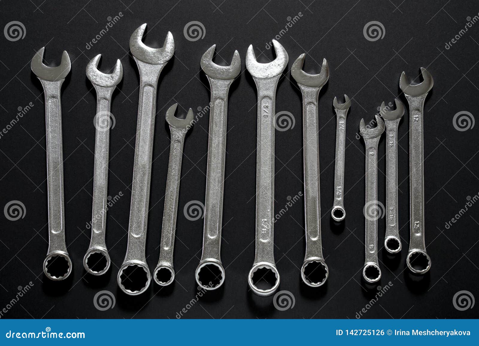 Spanner Set. Silver Coloured Spanners Lying Side by Side in Black ...
