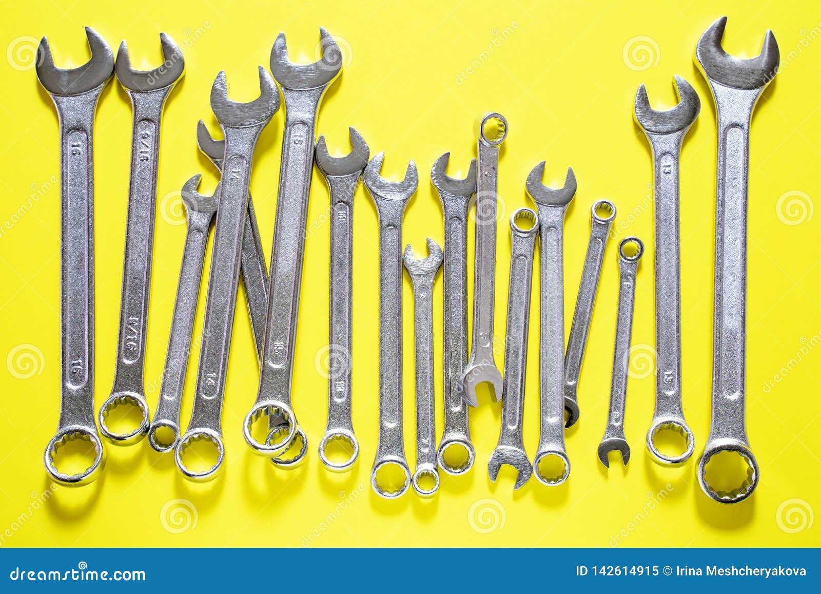 Spanner Set. Silver Coloured Spanners Lying Side by Side in Yellow ...