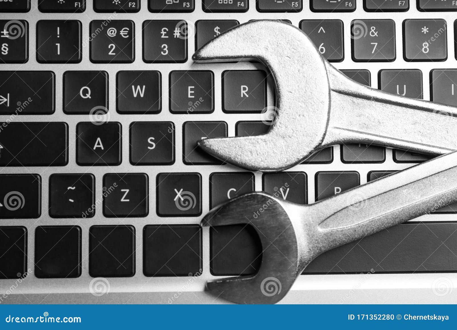 Spanners on Laptop. Concept of Technical Support Stock Photo - Image of ...