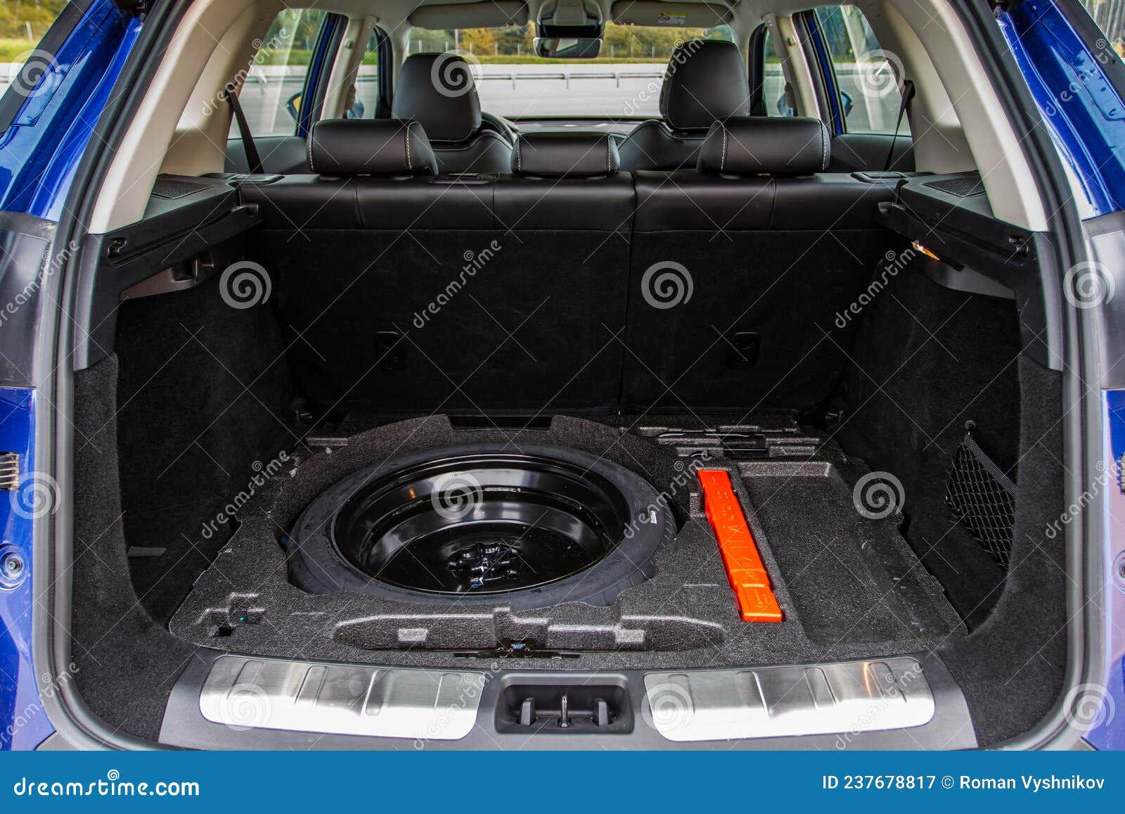 Spare Wheel in the Trunk of a Modern Car. Stock Image - Image of tyre ...