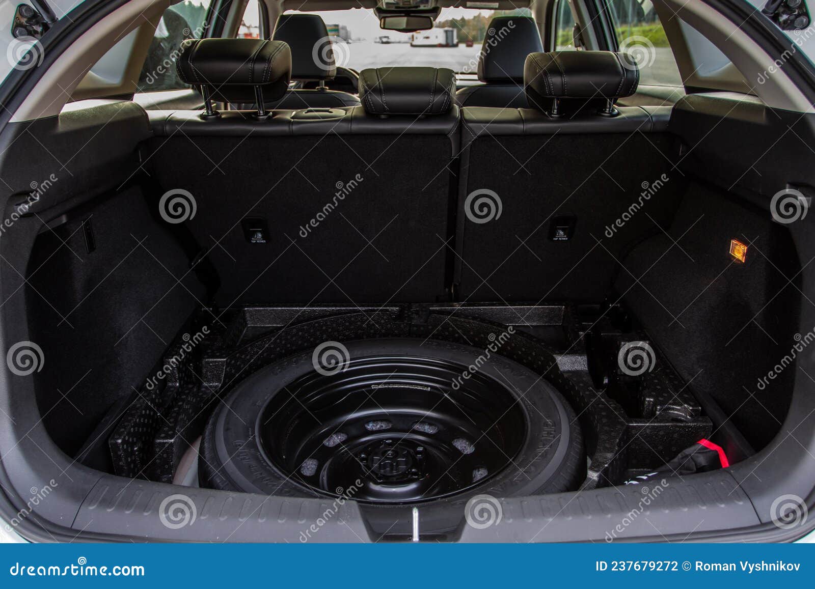 Spare Wheel in the Trunk of a Modern Car. Stock Photo - Image of trip ...
