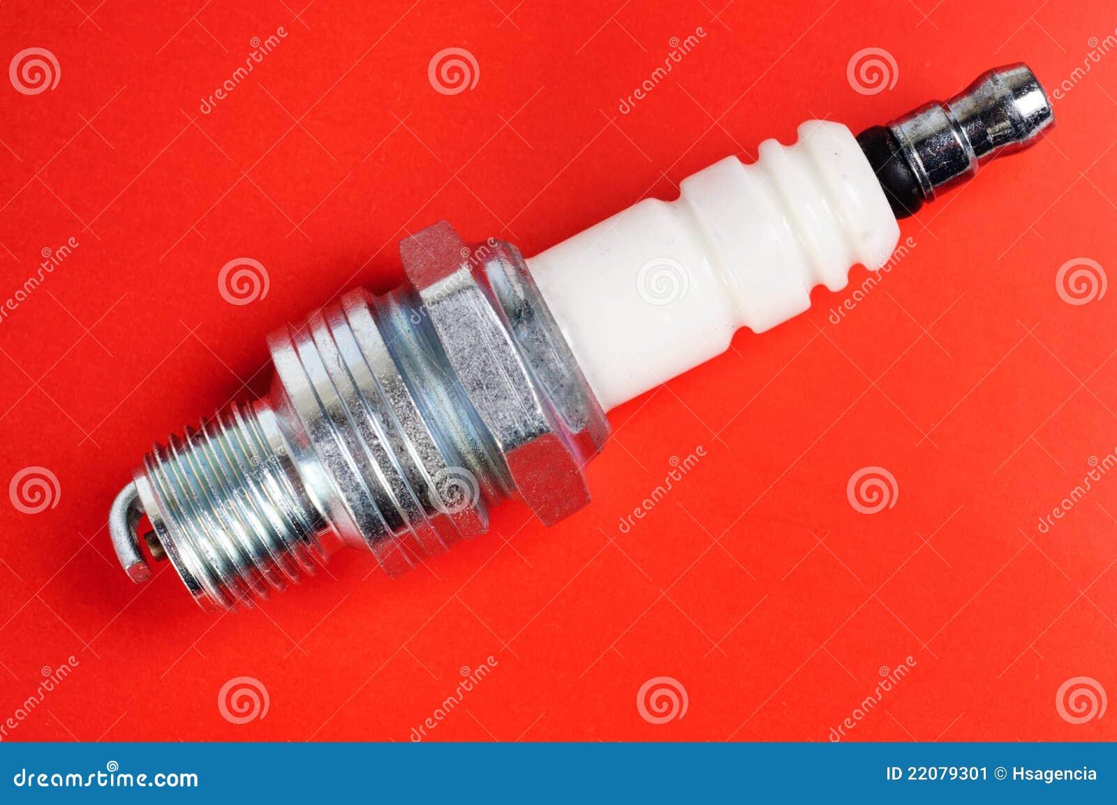 Spark-plug on the red stock image. Image of industrial - 22079301