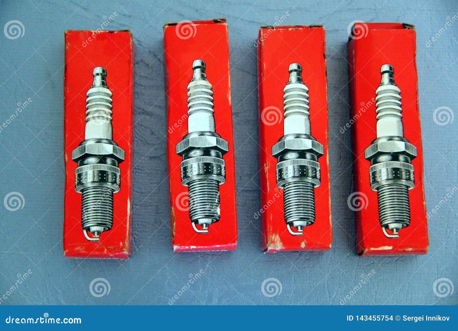The Spark Plugs in the Old Packaging Stock Photo - Image of screwdriver ...