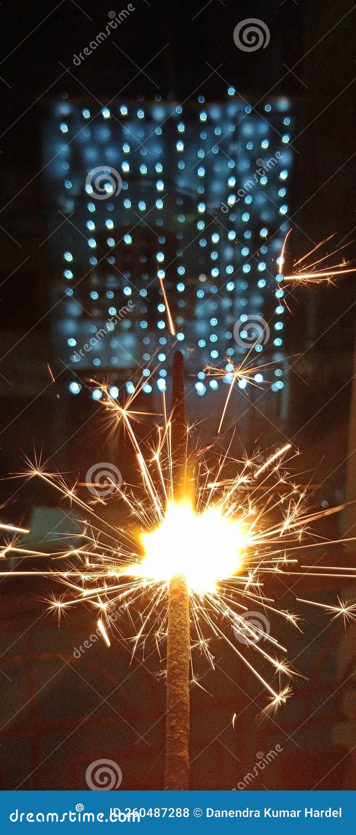 Sparkler on Blue Light Background during Diwali 2022, a Small Firework ...