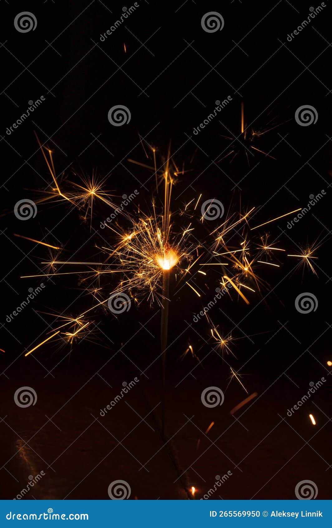 Sparkler burns in the dark stock photo. Image of bright - 265569950