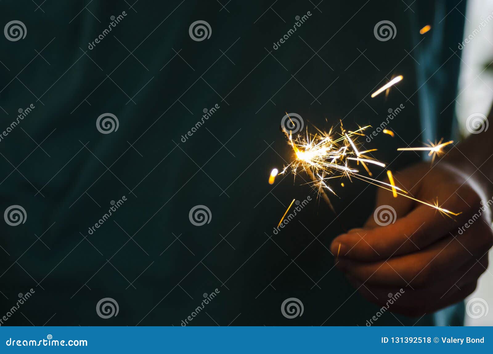 Sparkler Fire in Hand stock photo. Image of flame, isolated - 131392518