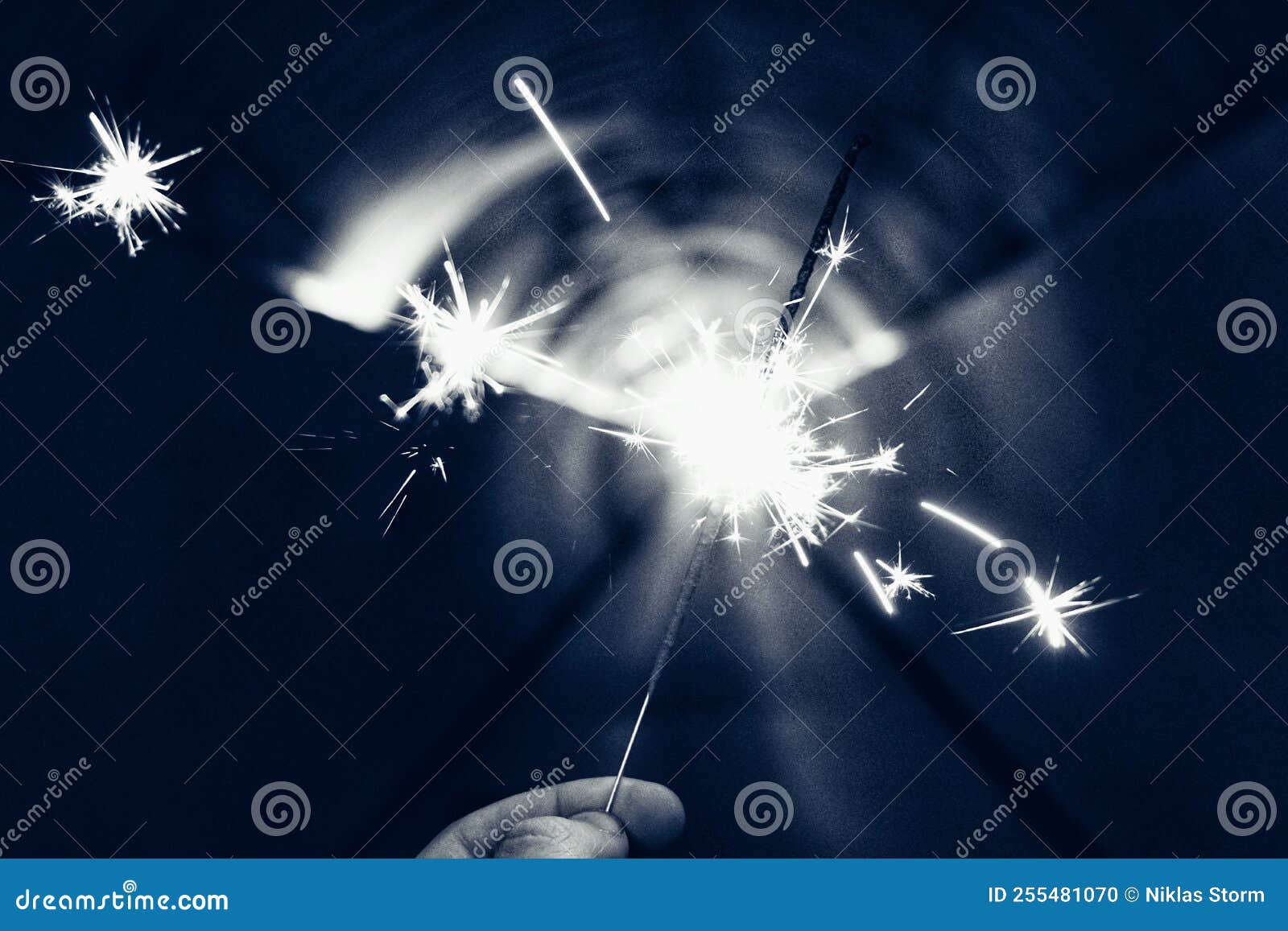 Cropped Hand Holding Sparkler in Tunnel Stock Photo - Image of hand ...