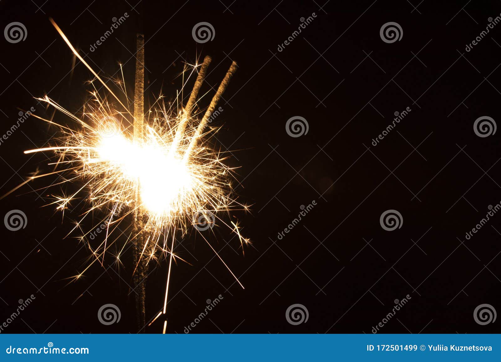Sparklers in the Dark. Sparks with Fire in Hands on a Stick. Awesome ...