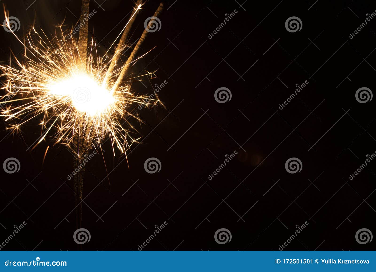 Sparklers in the Dark. Sparks with Fire in Hands on a Stick. Awesome ...