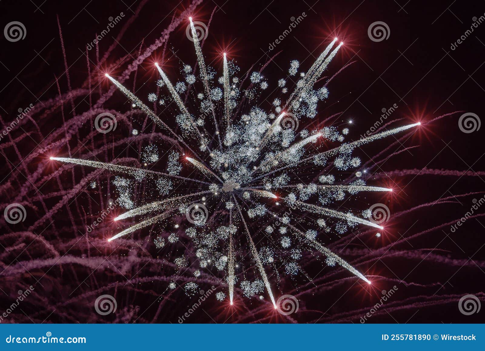 Sparkly Burst of a Red Firework in the Night Sky Stock Photo - Image of ...
