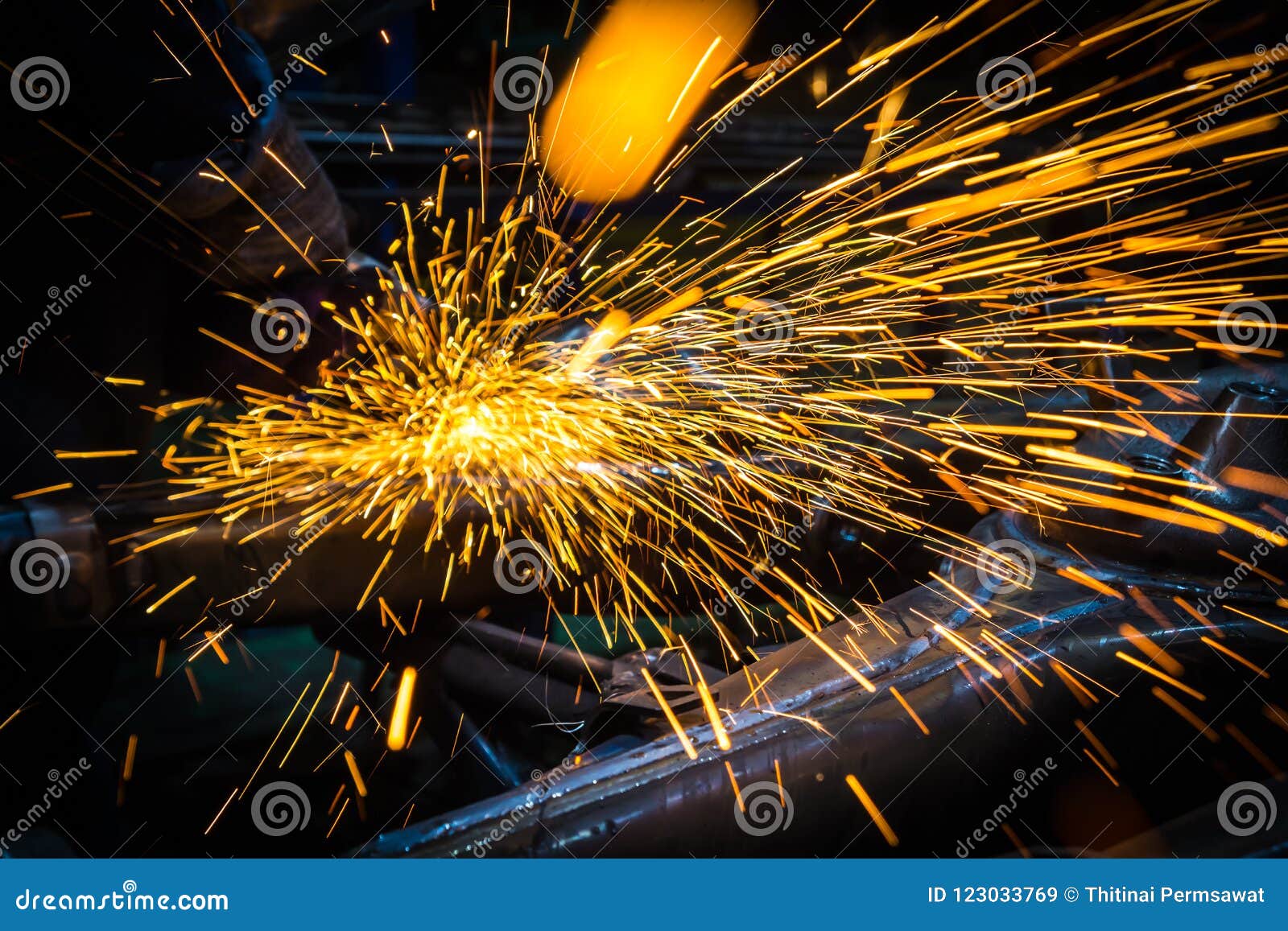 Sparks while grinding iron stock image. Image of steel - 123033769