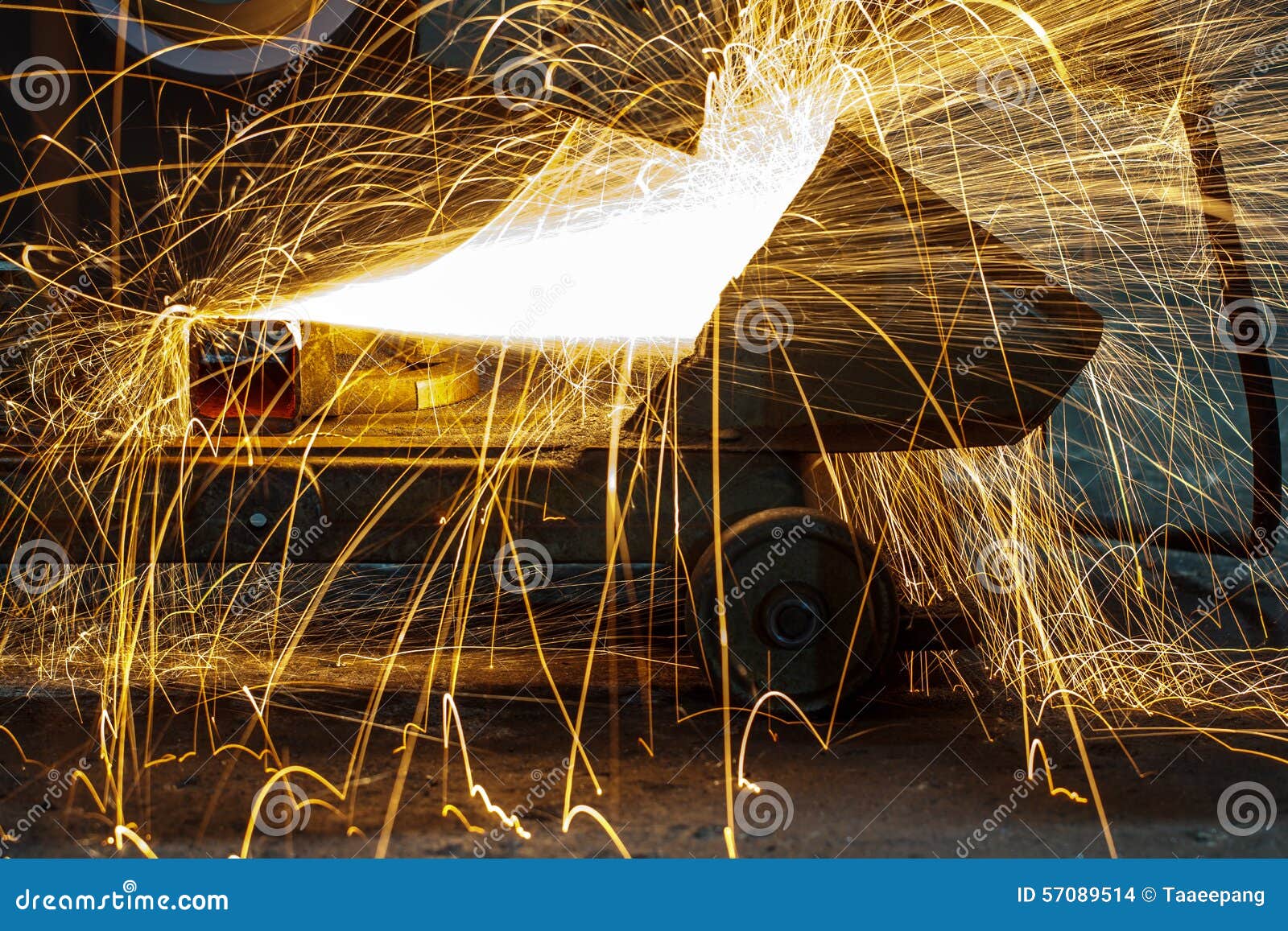 Sparks while grinding iron stock photo. Image of safety - 57089514